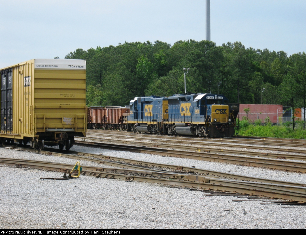 CSXT GP40-2 and slug mate sit with an empty ballast train at Union City, GA near Atlanta.